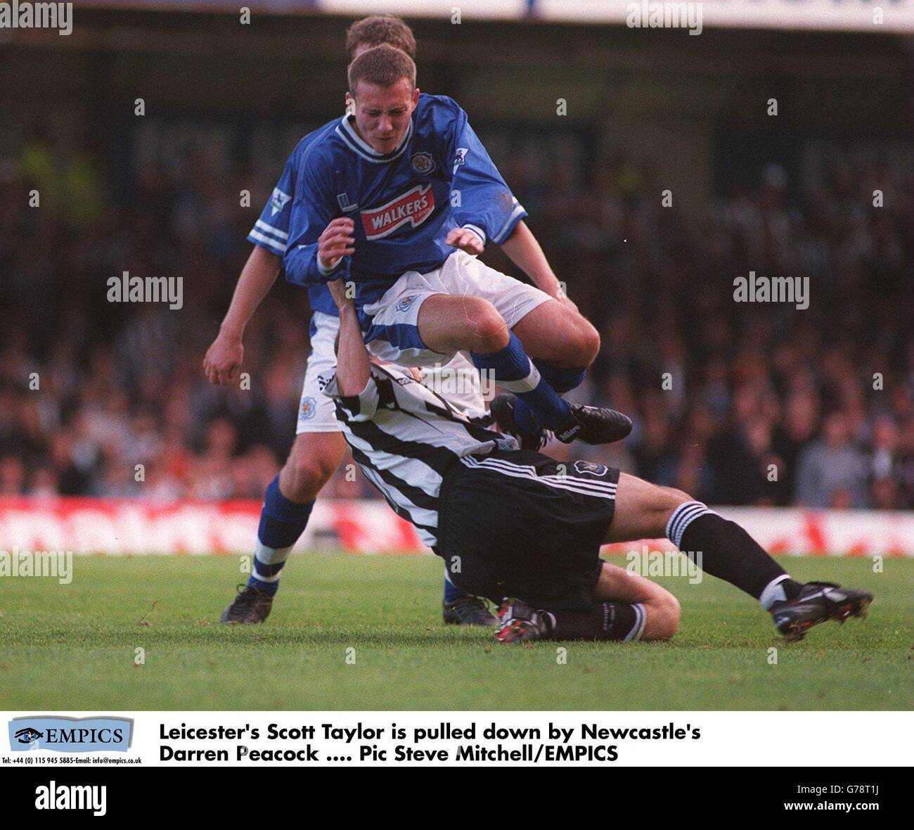 Leicesters scott taylor is pulled down by newcastles darren peacock hi ...