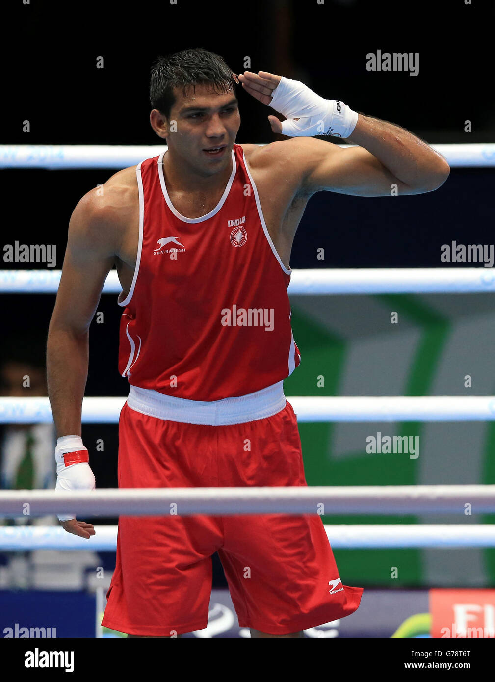 India's Manoj Manoj Kumar celebrates winning his fight against Canada's Arthur Biyarslanov in ...