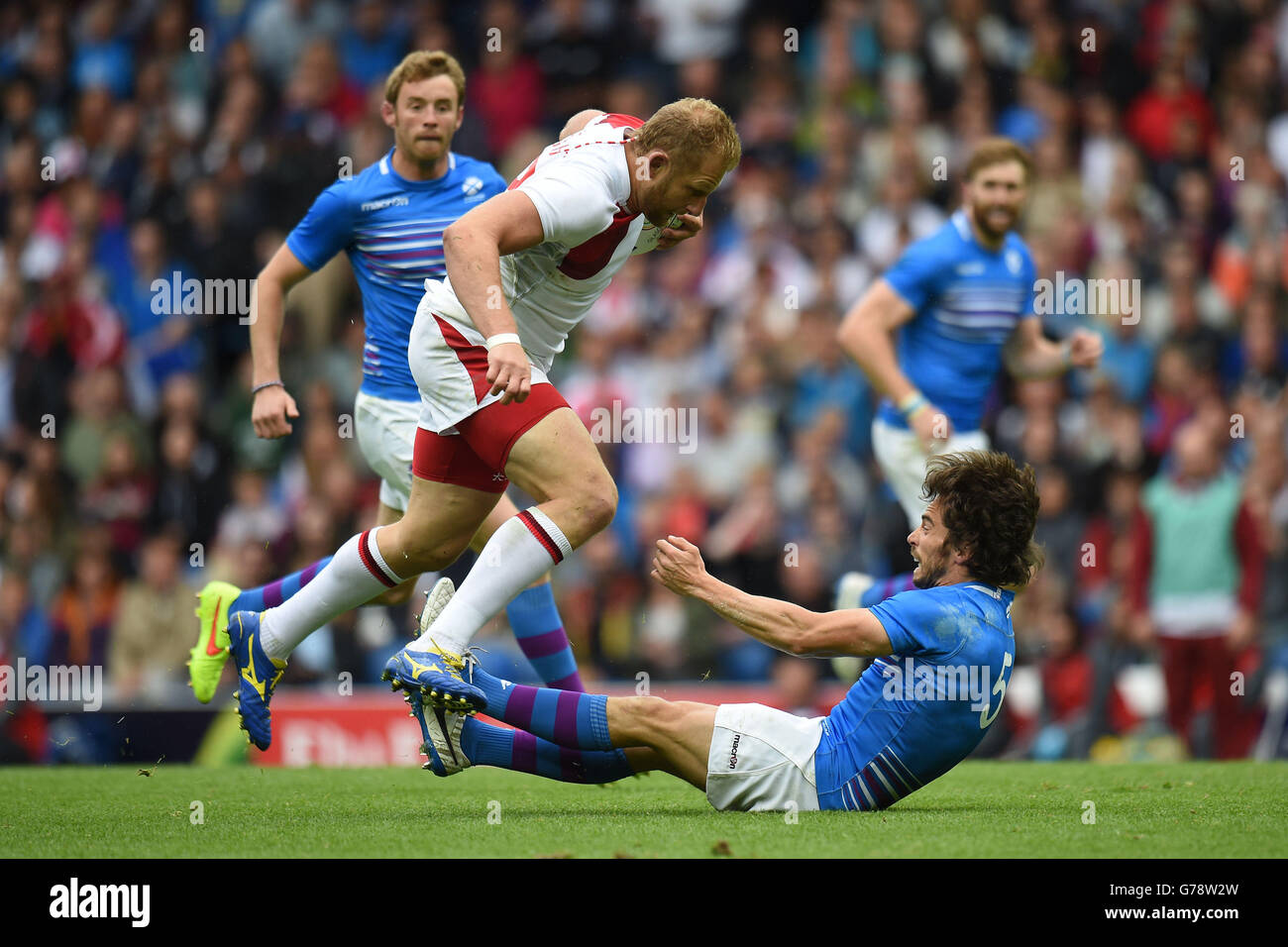 England's Mark Bright flattens Scotland's Colin Gregor during the Rugby ...
