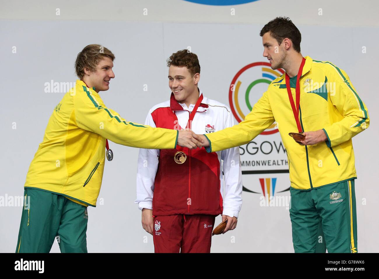 England's Oliver Hynd with his Gold medal on the podium with Silver ...