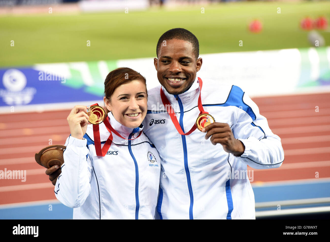 Scotland's Libby Clegg with her guide, holding her gold medal after ...