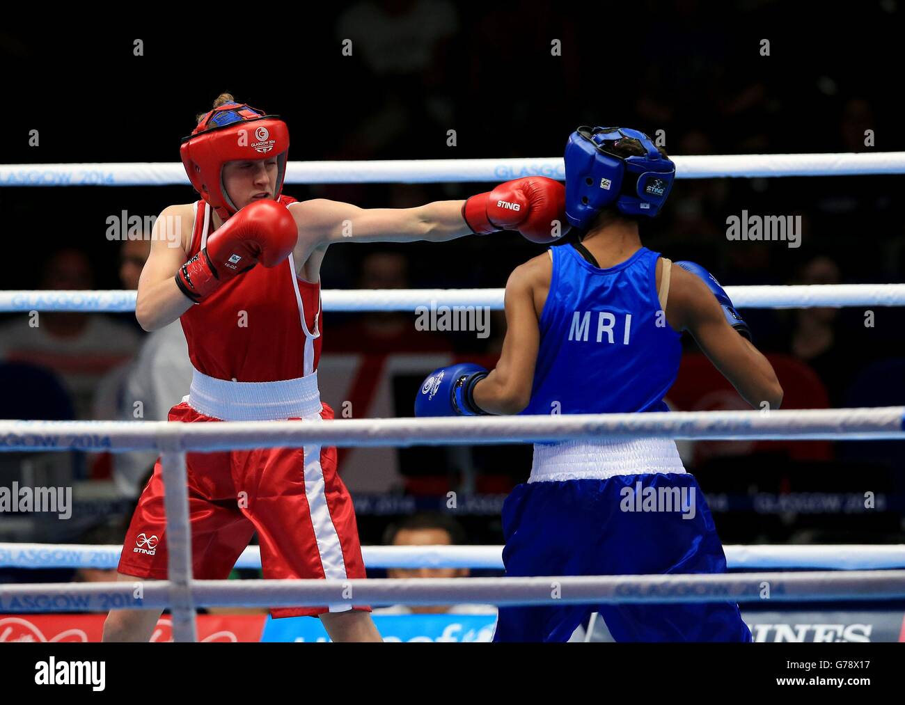Northern Ireland's Michaela Walsh (red) in action against Mauritius ...