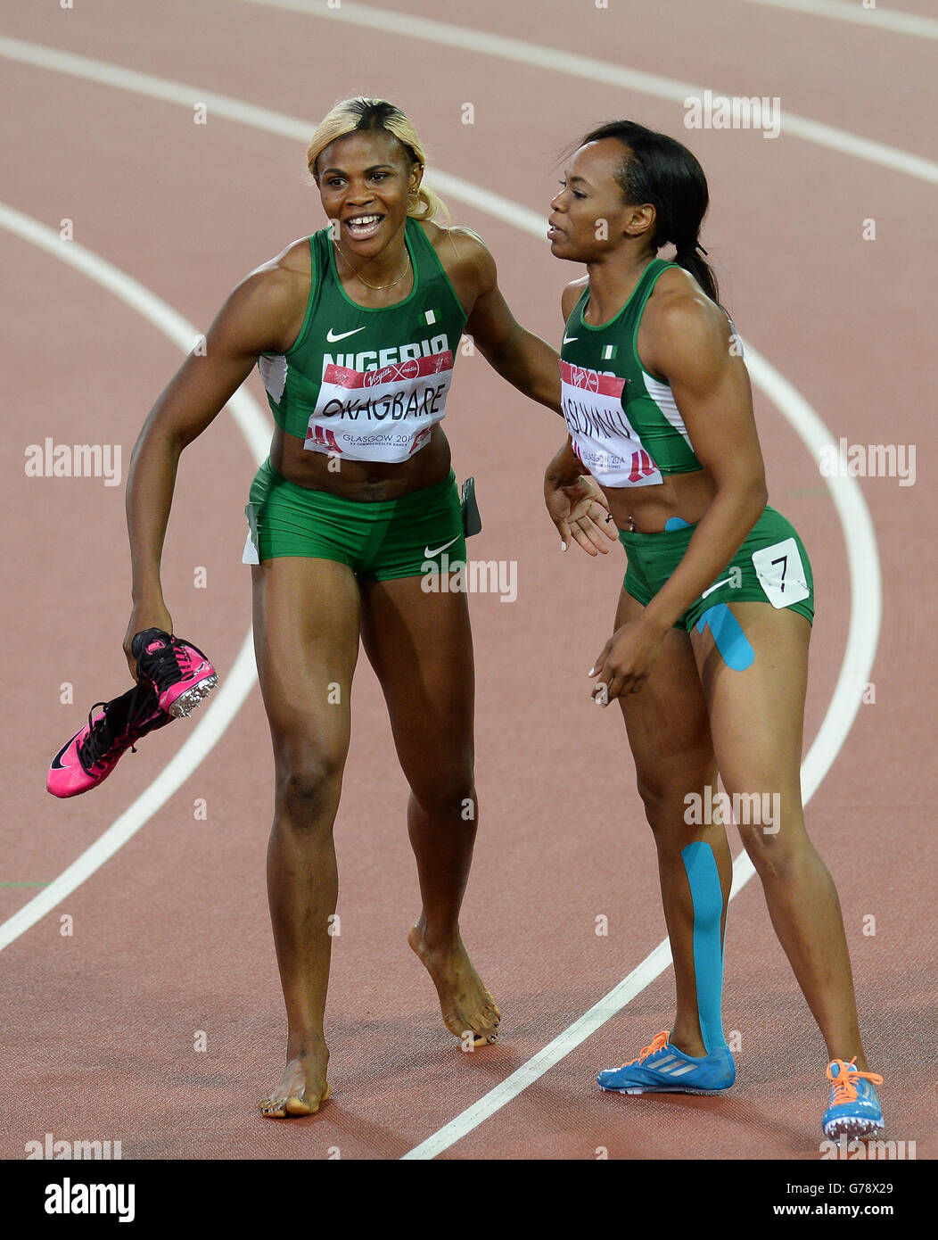 Nigeria's Blessing Okagbare (left) celebrates winning the Women's 100m ...