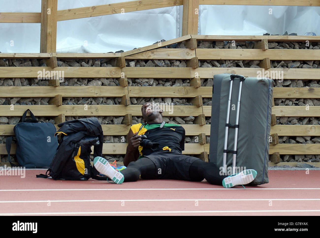 Jamaica's Usain Bolt laughs during a training session at the warm up ...