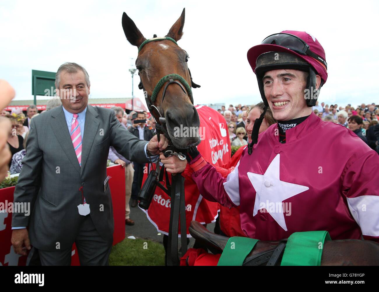 Trainer Noel Meade and jockey Shane Shortall celebrate the victory of ...
