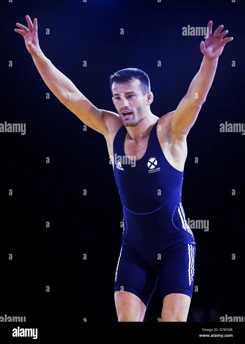 Scotland's Viorel Etko celebrates winning the FS 61 kg wrestling bronze ...