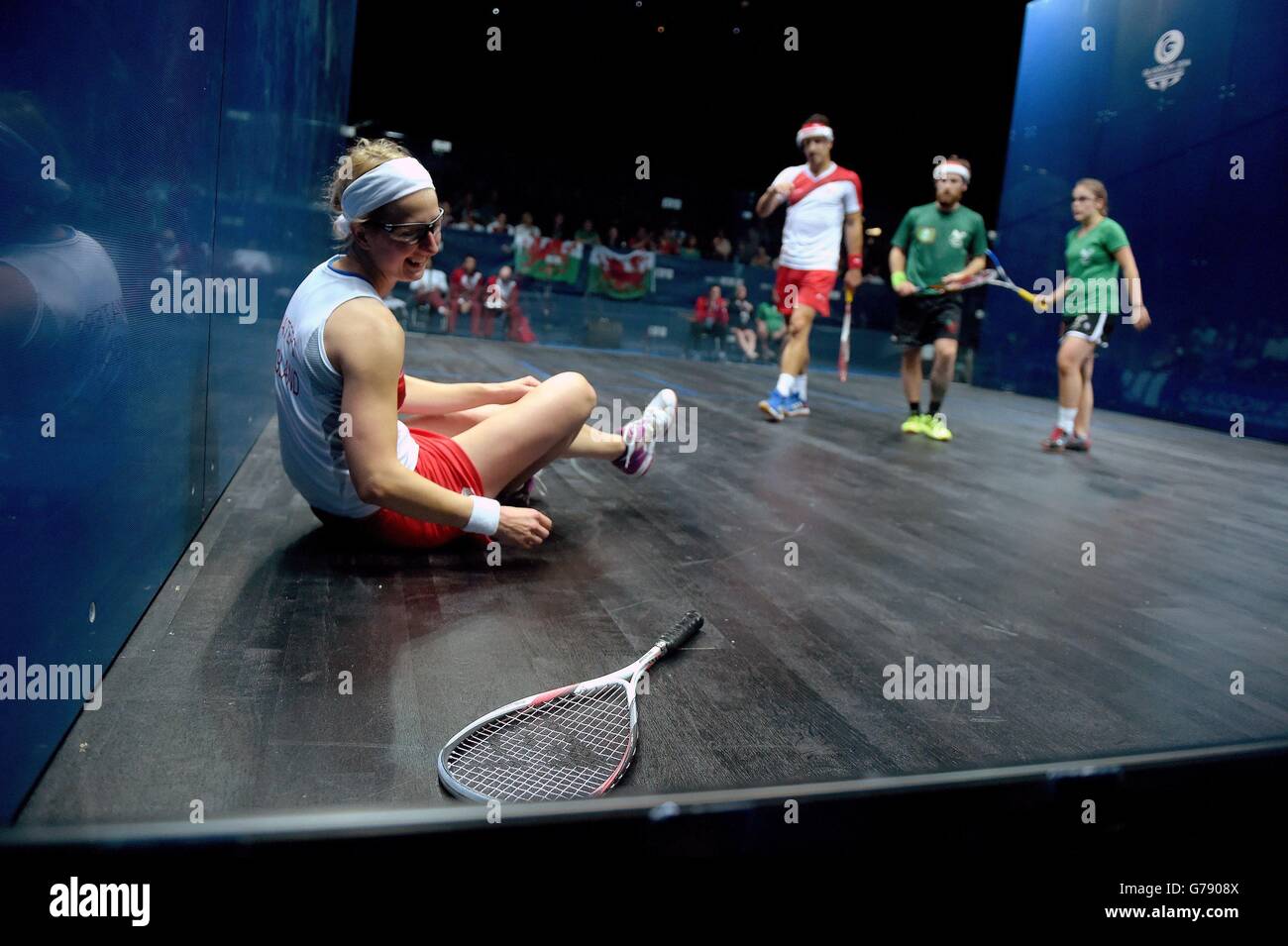 England's Alison Waters laughs after dropping her racket, with Peter ...