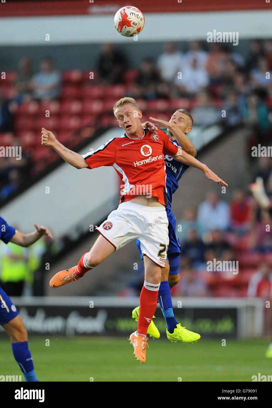 Walsall's Ashley Grimes (front) and Leicester City's Paul Konchesky ...