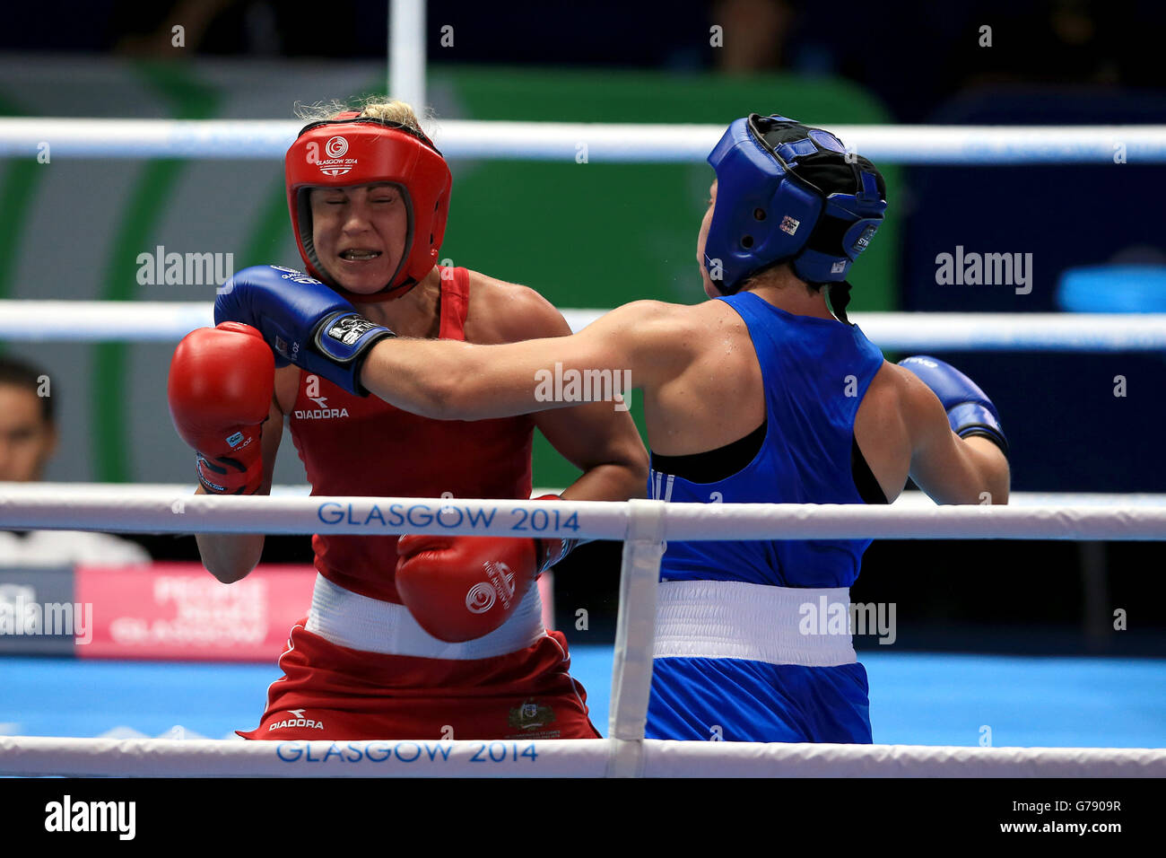 Wales' Lauren Price in action against Australia's Kaye Scott (left) in ...