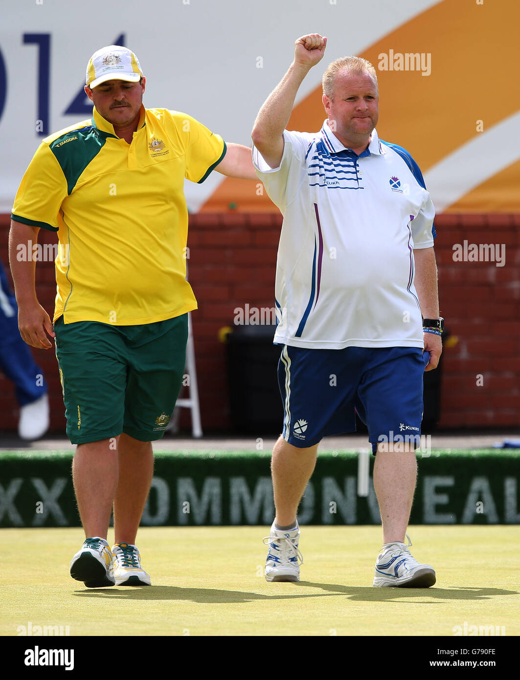 Scotland's Darren Burnett (right) after winning against Australia's ...