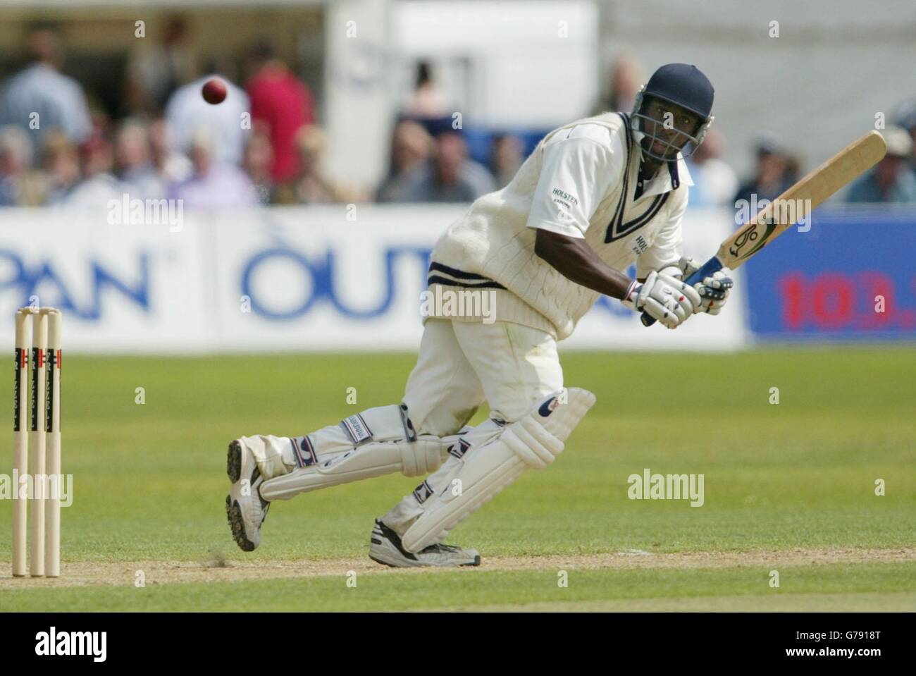 Kent's Michael Carberry hits a ball from Sussex bowler Jason Lewry on ...