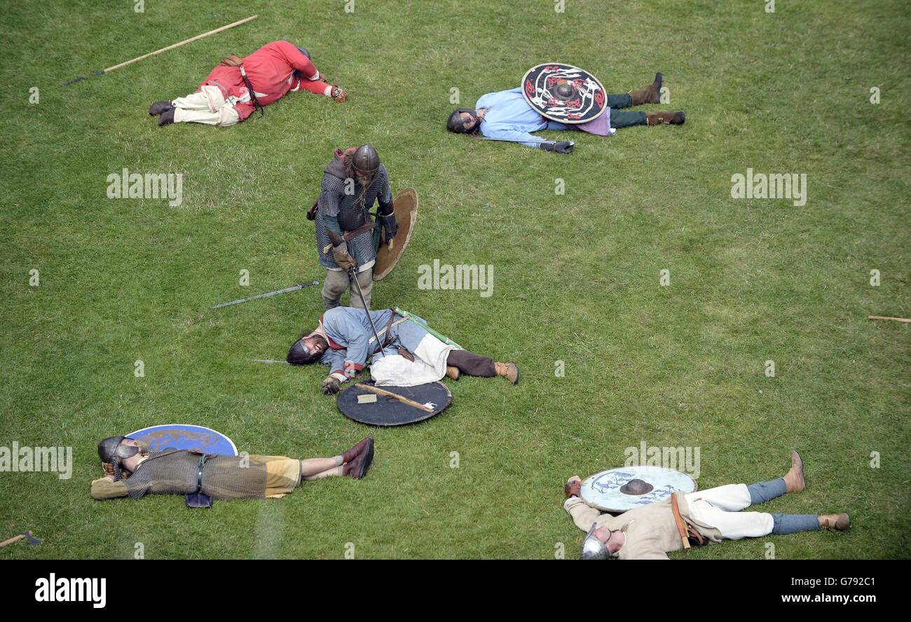 A re-enactment of a Viking attack takes place at Lindisfarne Priory ...