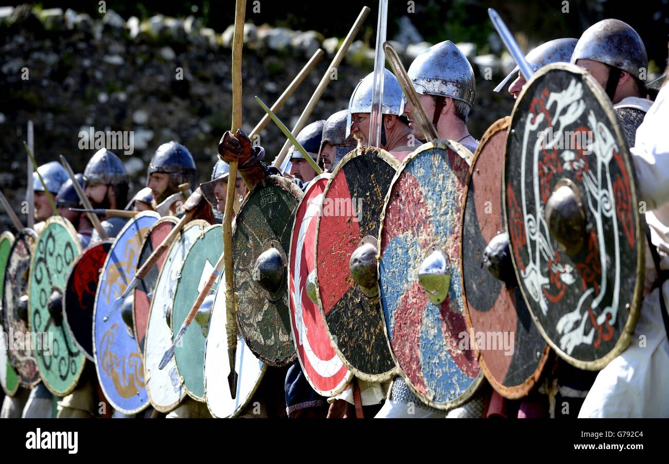 A re-enactment of a Viking attack takes place at Lindisfarne Priory ...