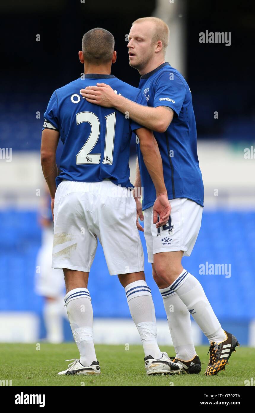 Everton's Steven Naimsith celebrates with Leon Osman during Leon Osman ...