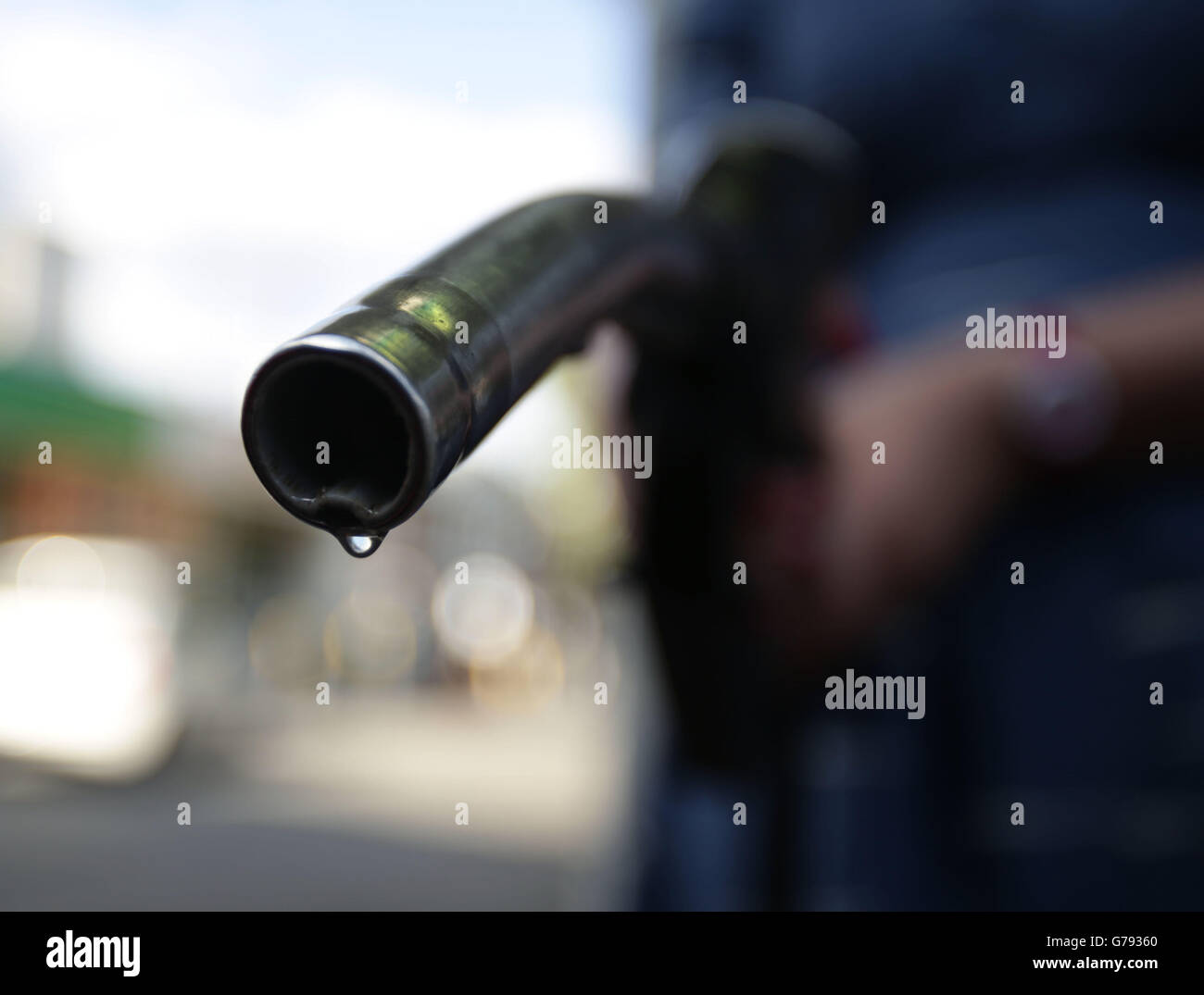 Petrol Pump Station GVs. A car being filled up with a pump at a petrol ...