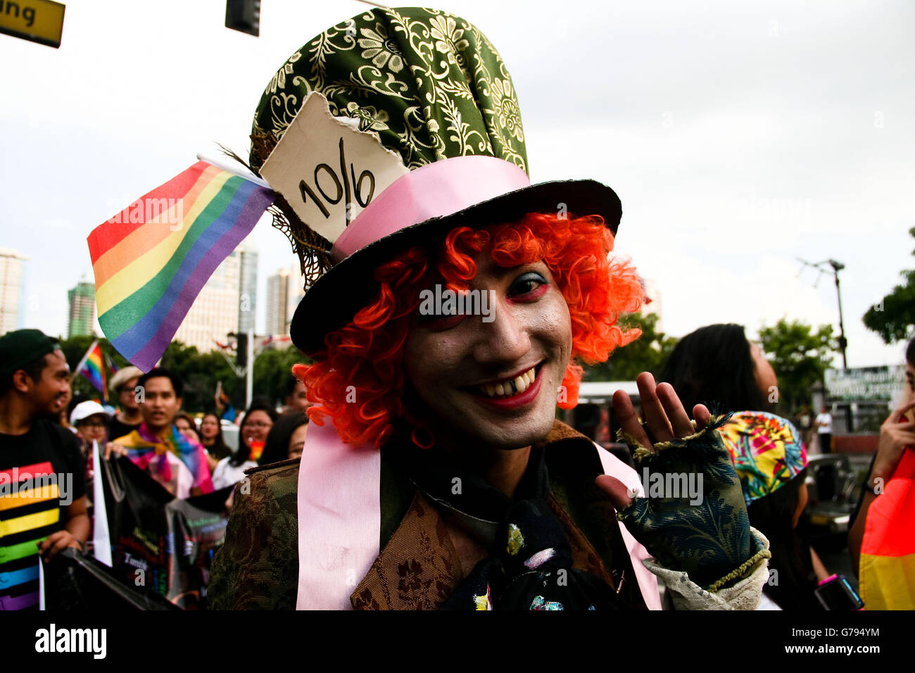 Philippines. 25th June, 2016. An LGBTQ member wearing a Mad Hatter ...