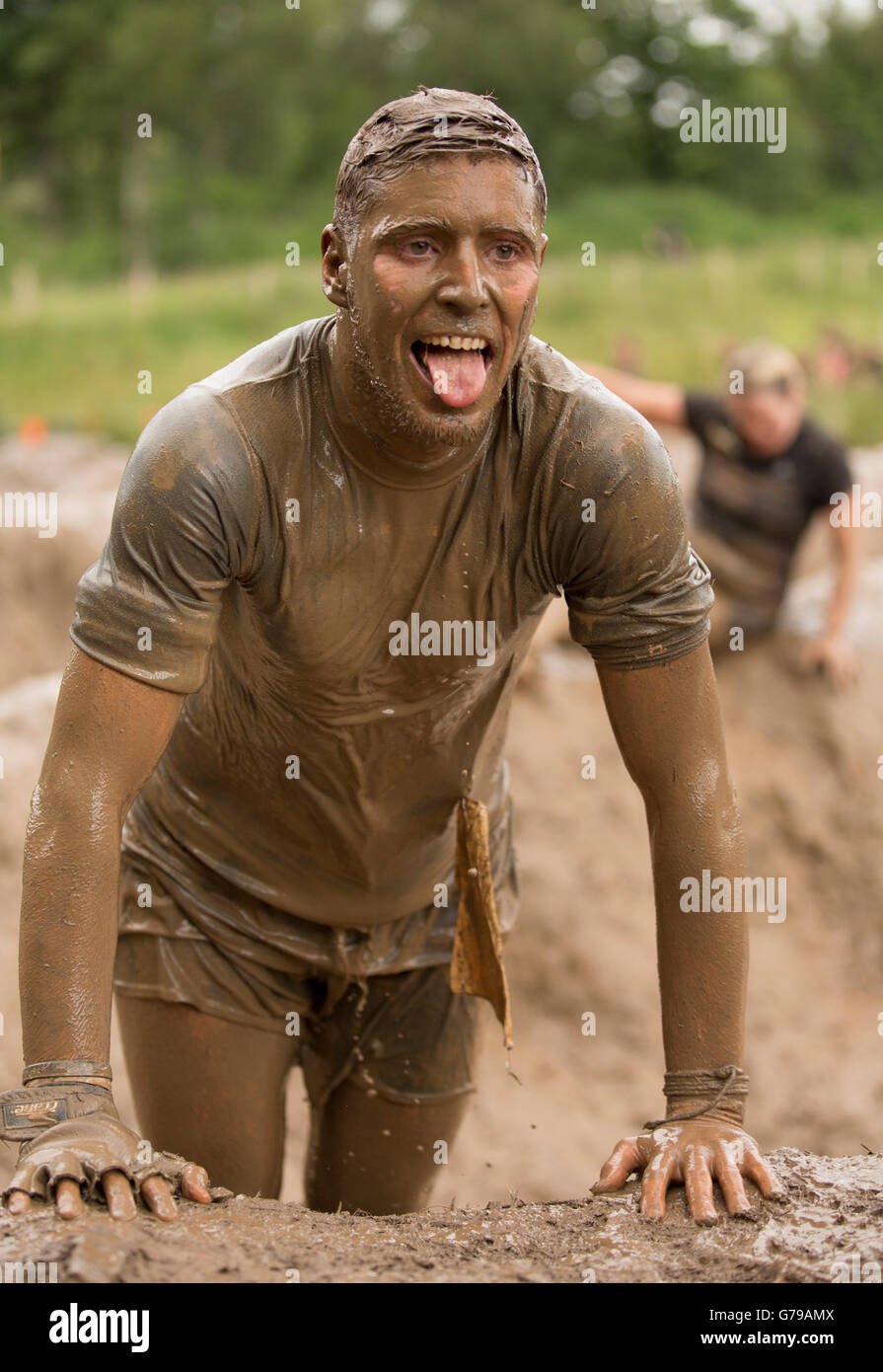 Muddy man at Tough Mudder at Drumlanrig Castle, Dumfries and Galloway ...