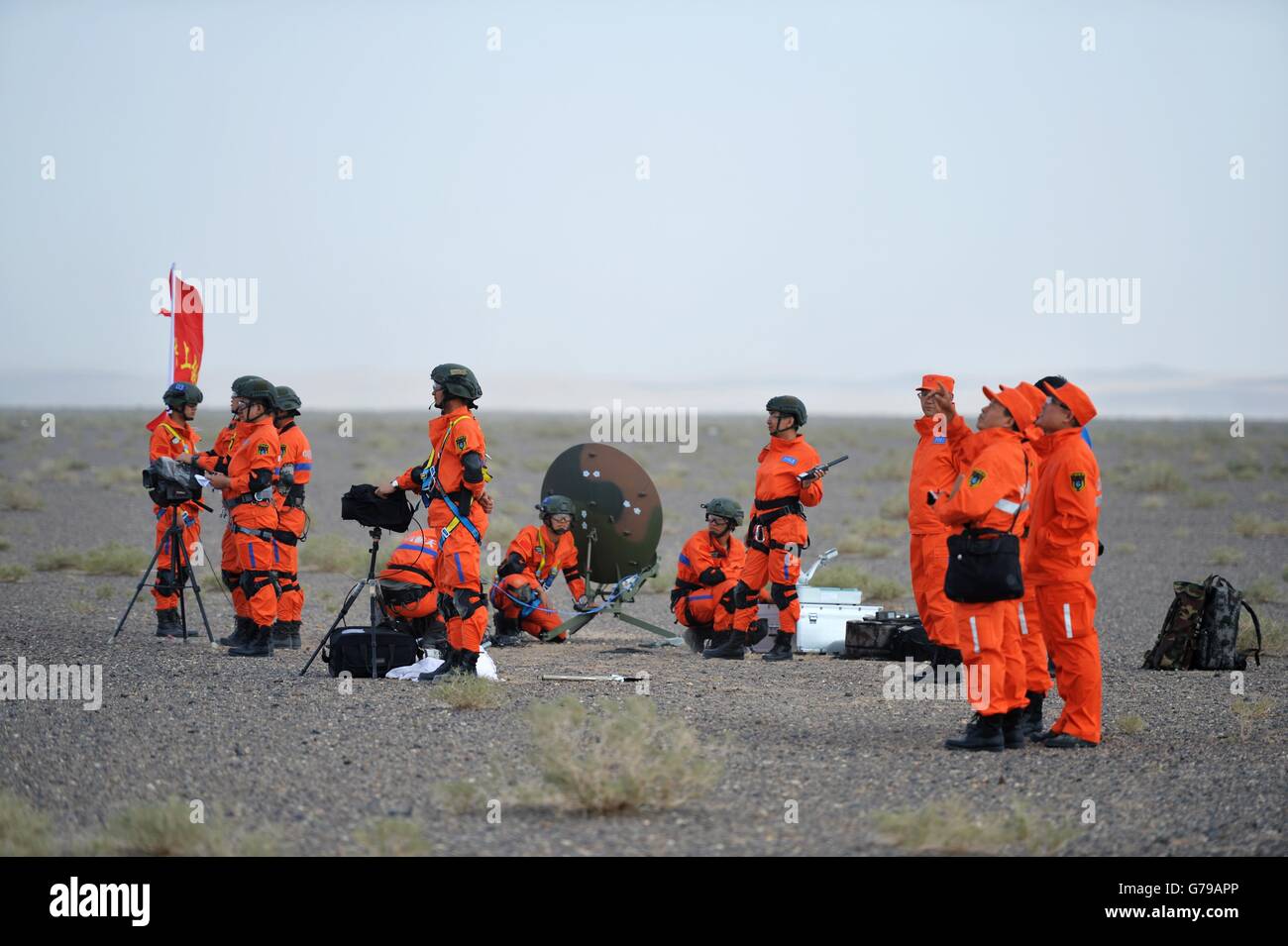 Jiuquan. 26th June, 2016. Technical personnel monitor the reentry ...