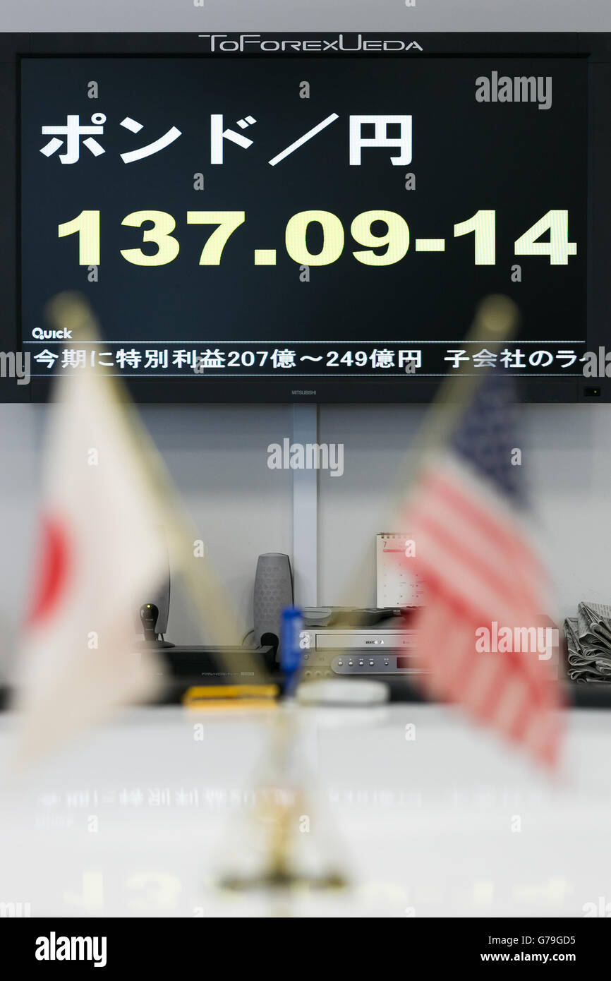 An electronic stock board displays the Japanese yen traded at the ...