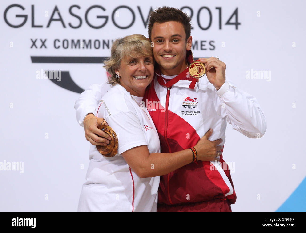 England's Tom Daley with his coach Jane Figueiredo and his gold medal ...