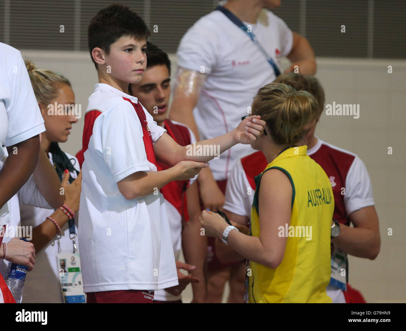 England's Matthew Dixon holds his arm after the Diving Men's 10m ...