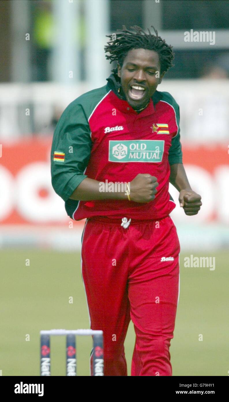 Zimbabwean bowler Douglas Hondo celebrates getting South Africa's ...