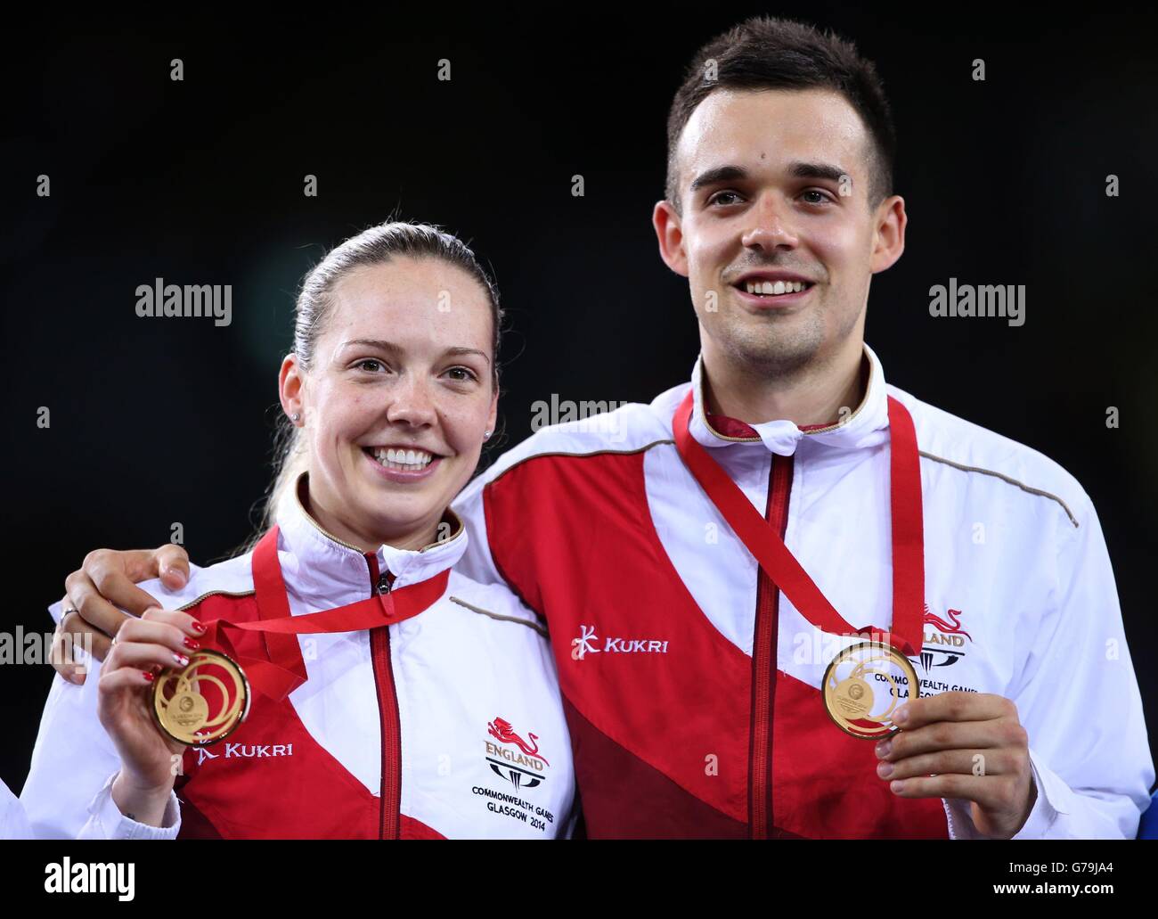 England's Chris Adcock and Gabrielle Adcock with their gold medals ...