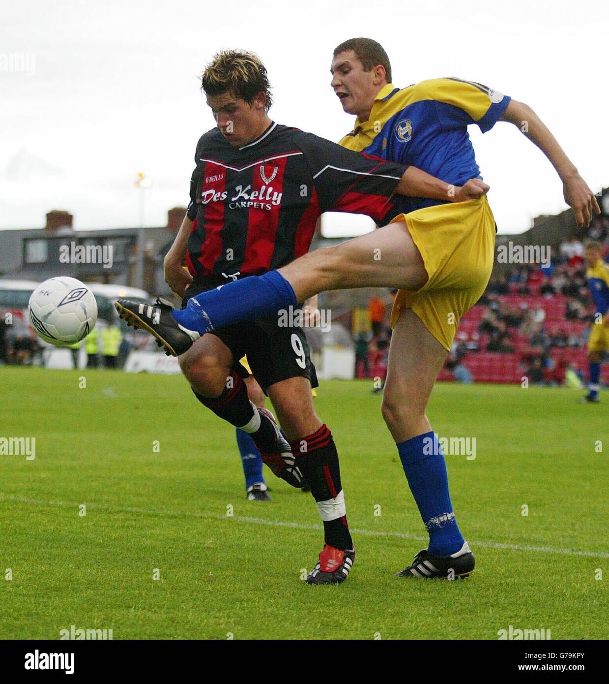 Robbie Doyle from Bohemians (red & black) battles with Valery Tarasenka ...