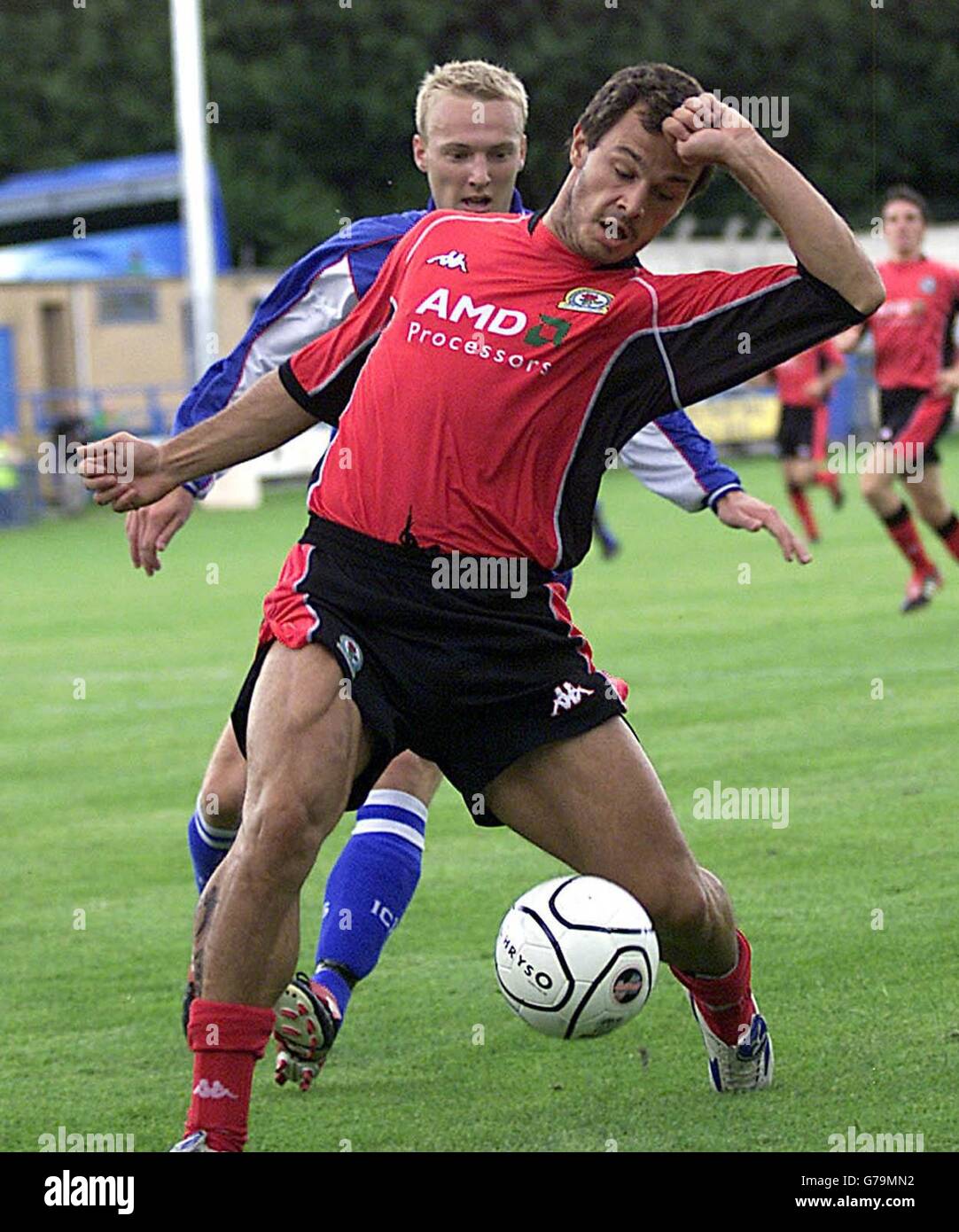 Blackburn Rovers' Corrado Grabbi (front) shields the ball from ...