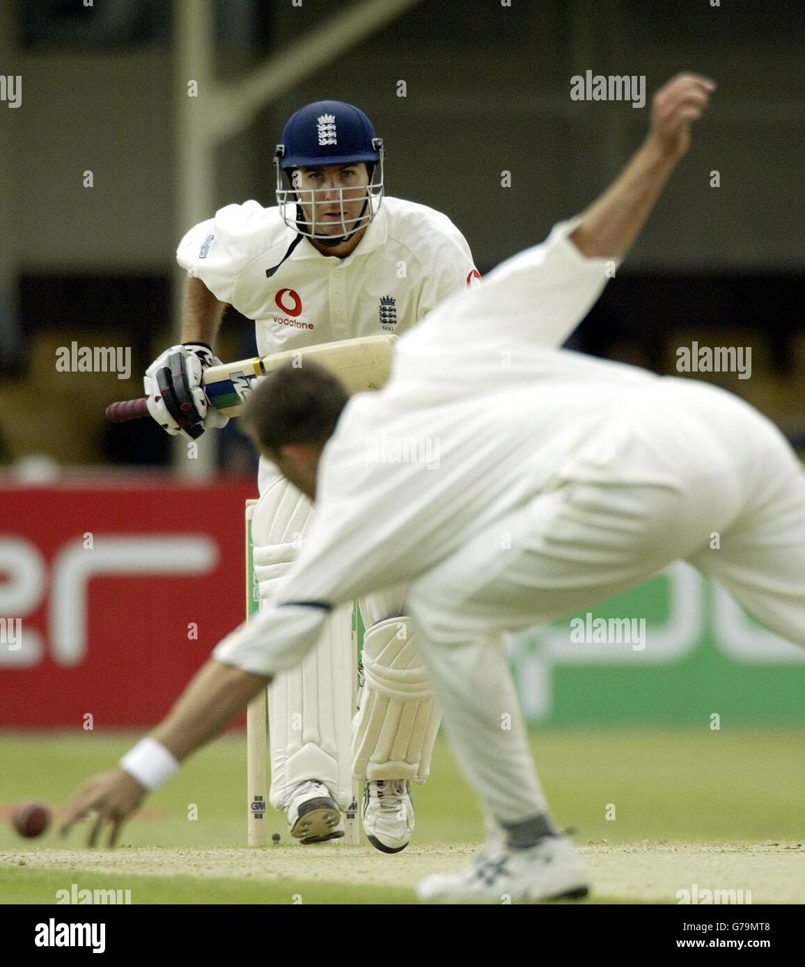England's Michael Vaughan drives past South African bowler Dewald ...