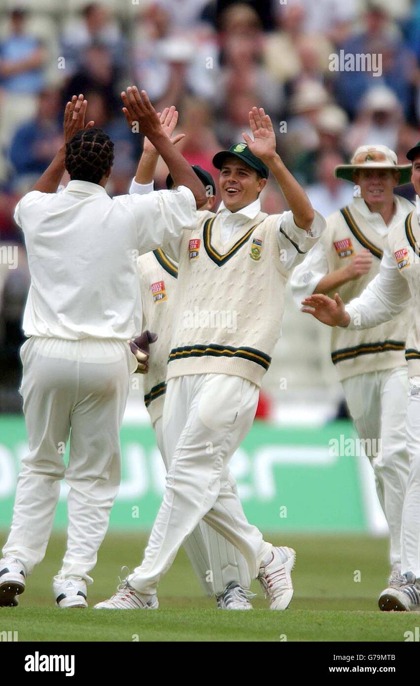 South Africa's Jacques Rudolph congratulates Makhaya Ntini (left) after ...