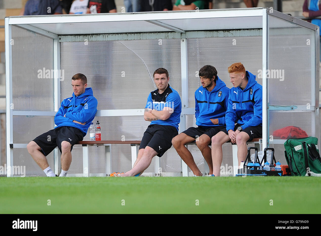 Coventry City players sit on the bench at Spytty Park Stock Photo - Alamy