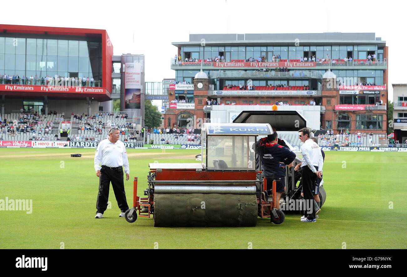 Umpires Marais Erasmus (left) and Rod Tucker (right) talk to ...