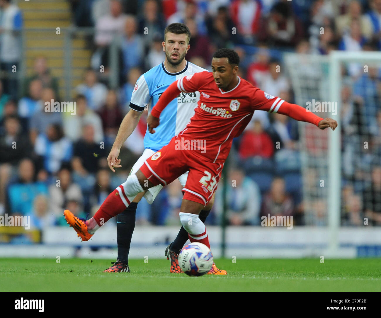 Blackburn Rovers' Grant Hanley (rear) and Cardiff City's Nicky Maynard ...