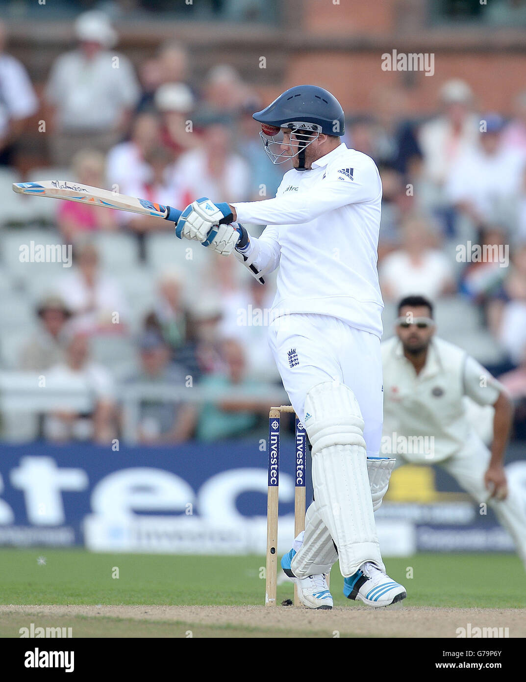 England's Stuart Broad is hit in the face by the ball after a delivery ...