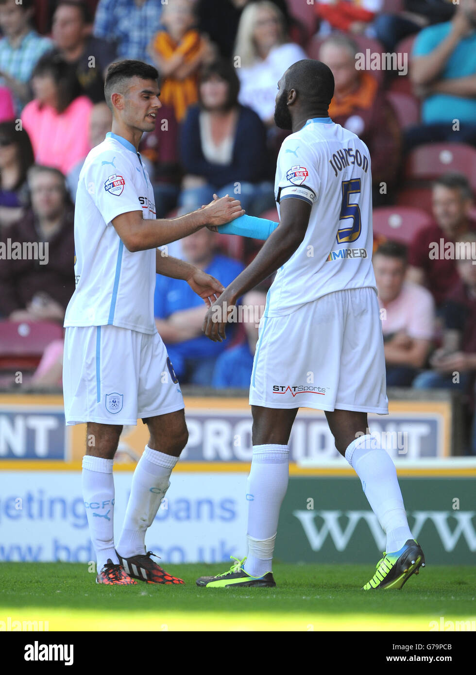 Coventry City's Reda Johnson (right) celebrates with Conor Thomas (left ...