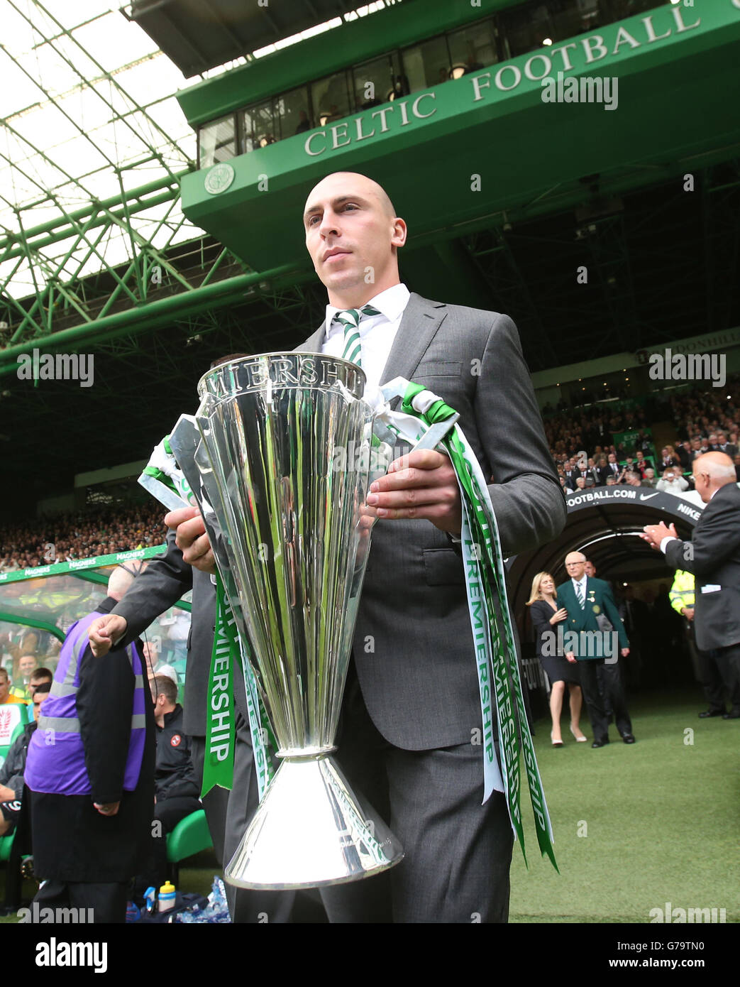 Celtic Captain Scott Brown with the League Trophy as former owner ...