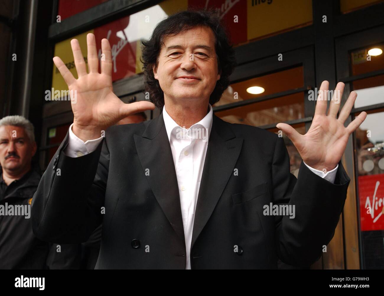 Led Zeppelin guitarist Jimmy Page creates hand prints outside the ...