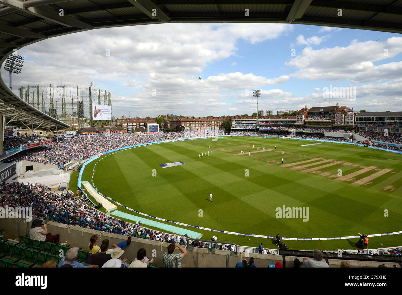 General view as crowds watch the action inside The Kia Oval Stock Photo ...