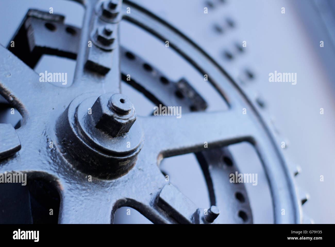 Photograph of a detail of a black industrial machine Stock Photo - Alamy