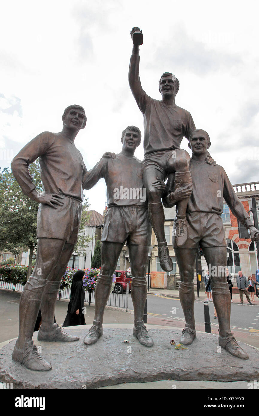 The statue outside Upton Park featuring Bobby Moore, Geoff Hurst, Ray ...