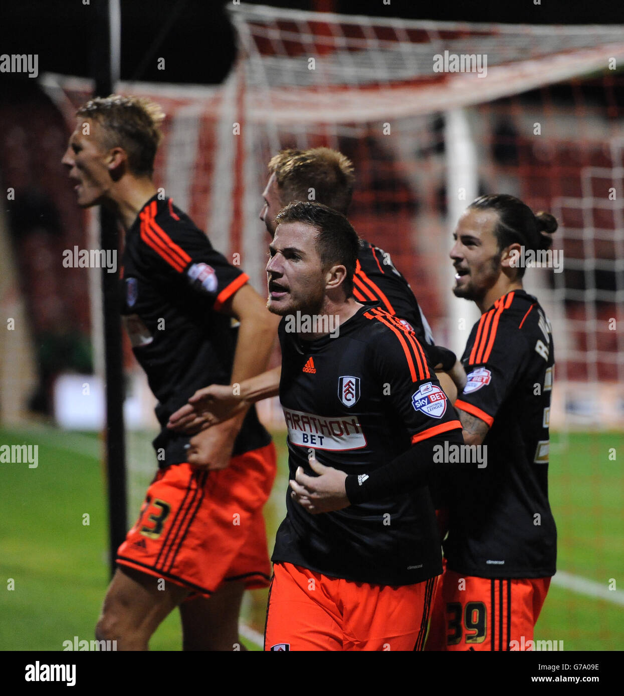 Fulham's Ross McCormack celebrates with his team mates after he scores ...