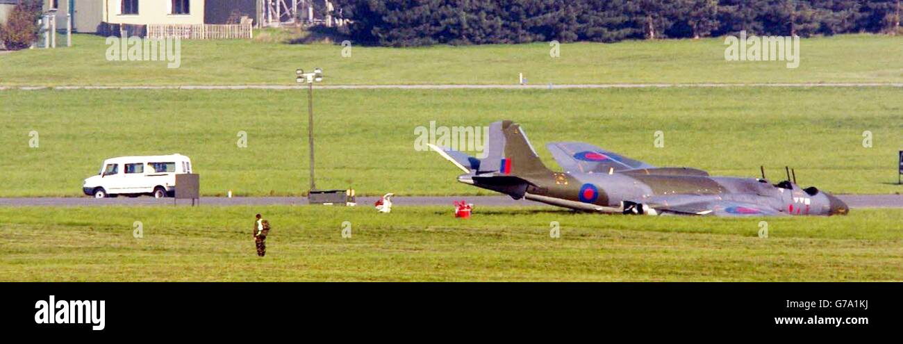The wreckage of the Canberra aircraft lies on the runway at RAF Marham ...