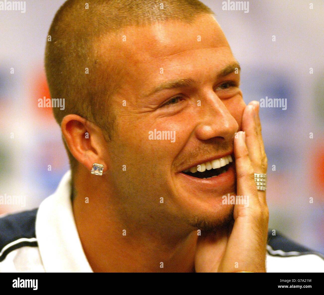 Sport football press conference smiling head shoulders david beckham hi ...