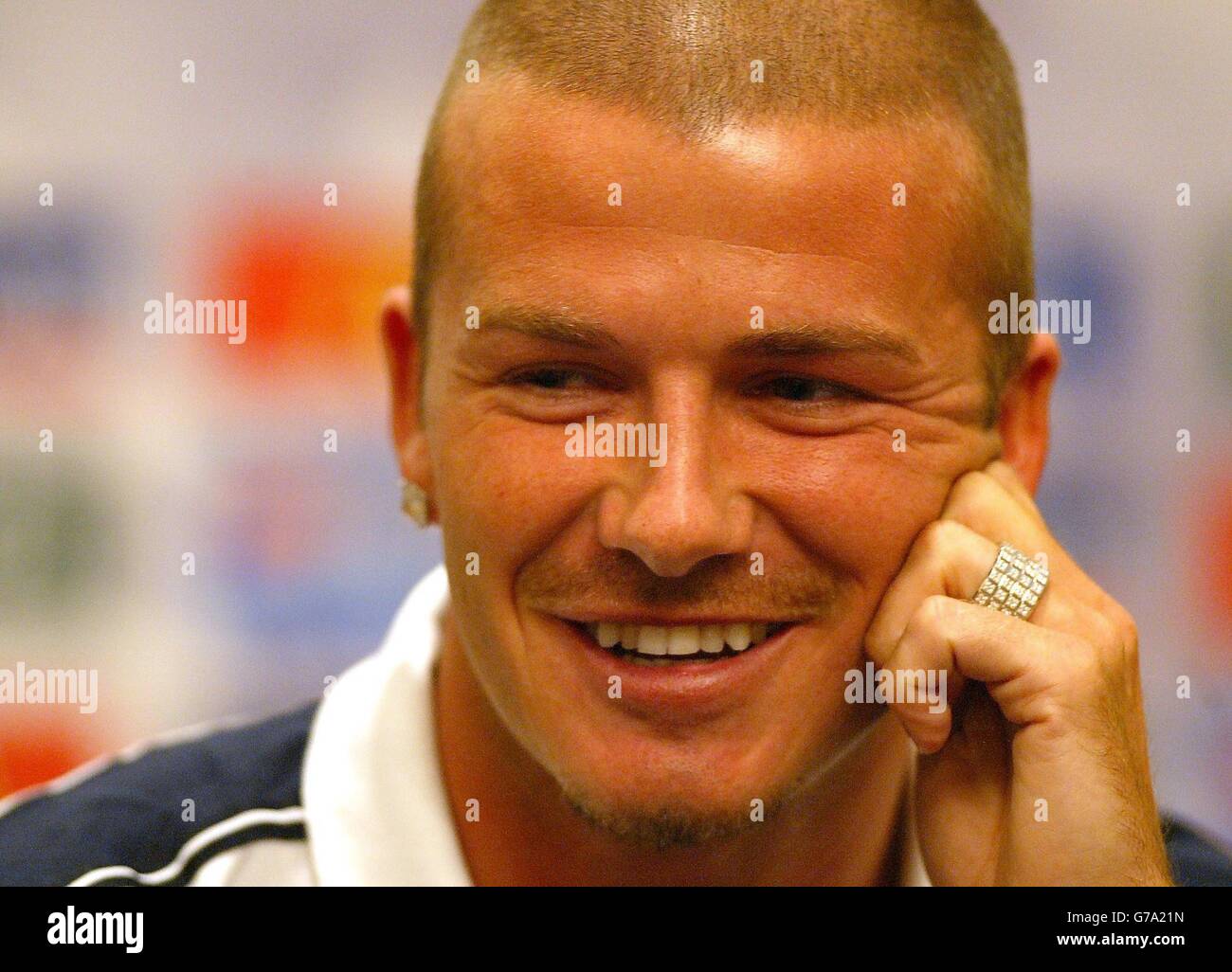 Sport football press conference smiling head shoulders david beckham hi ...
