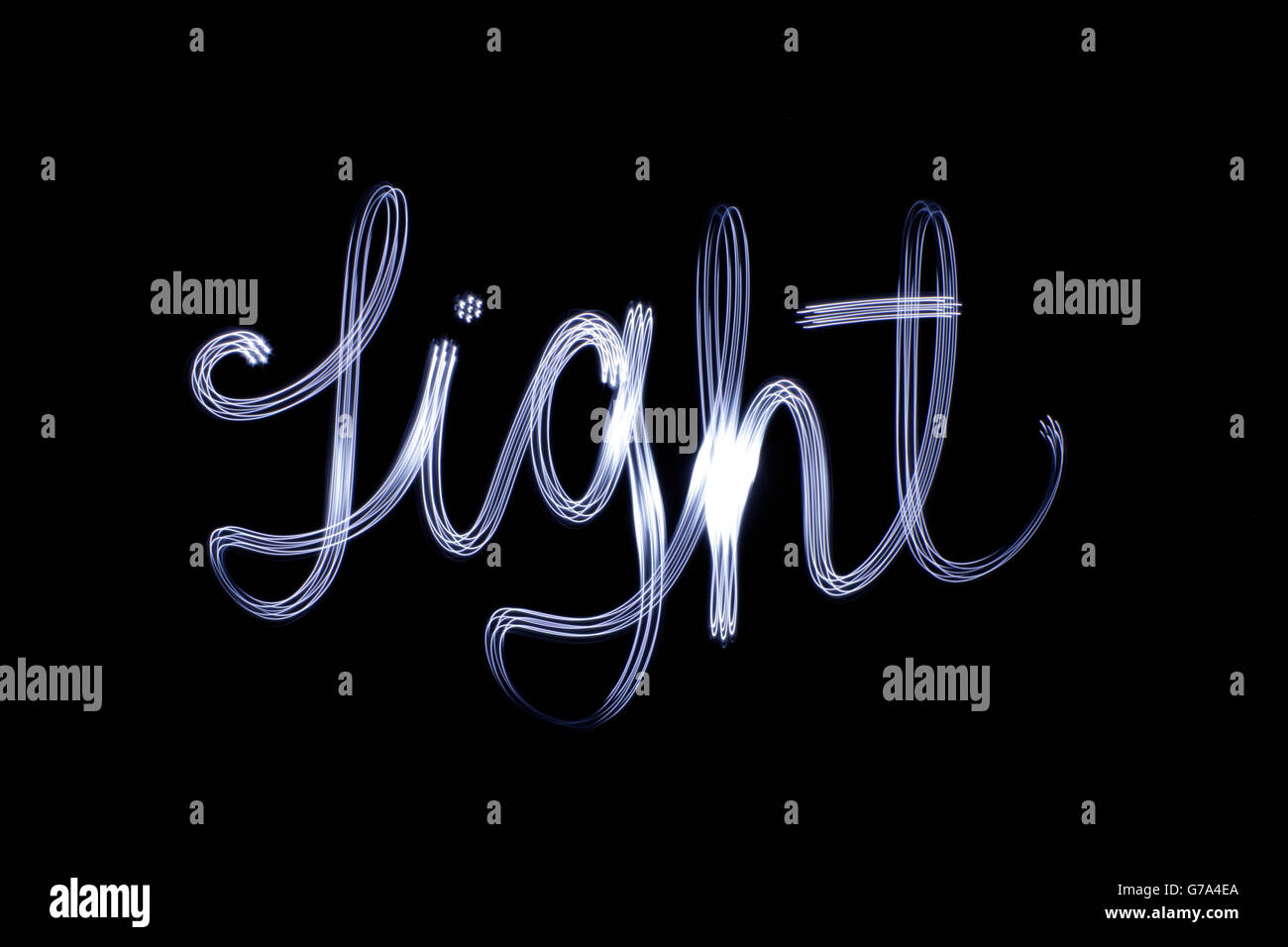 Photograph of a light drawing of the word Light with a long exposure ...