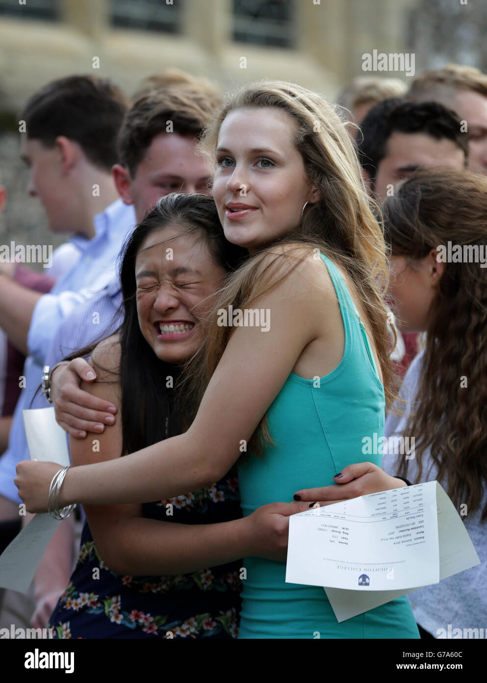 Tabitha Jackson (right) receives a hug from a friend as she celebrates ...