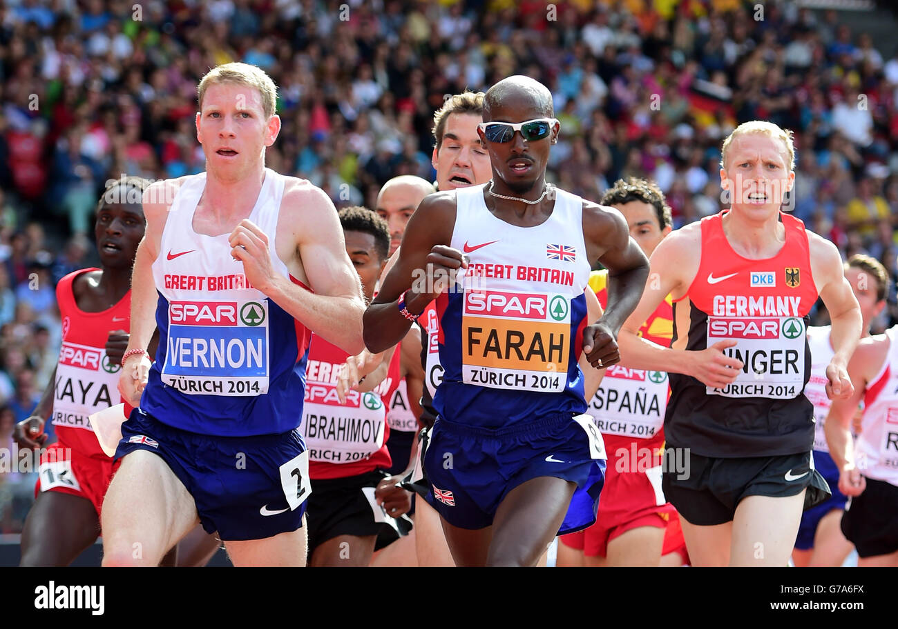 Great Britain's Mo Farah (centre) and Andy Vernon (left) durnig the Men ...