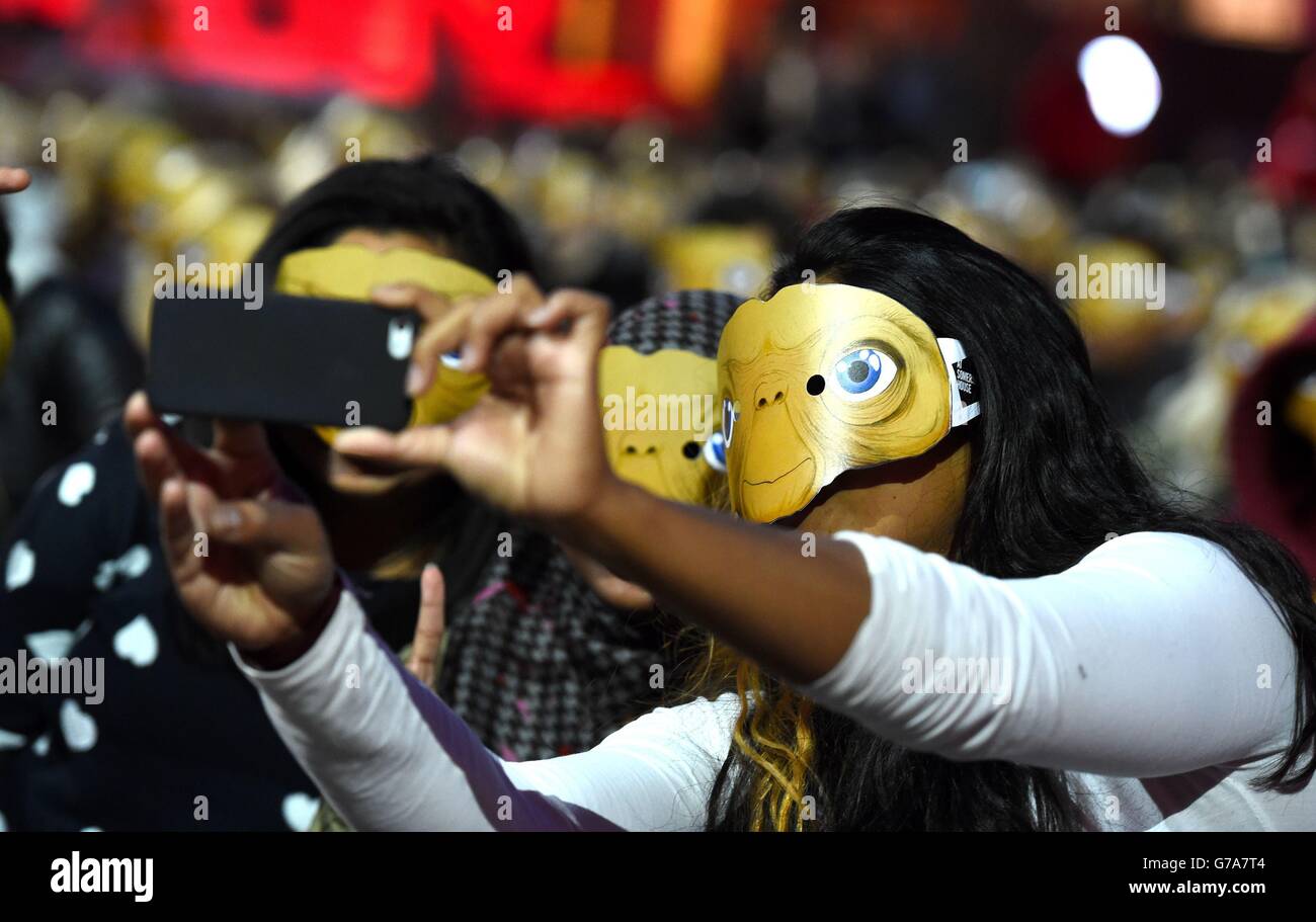 Film fans wearing E.T masks celebrate the 10th anniversary of the Film4 ...