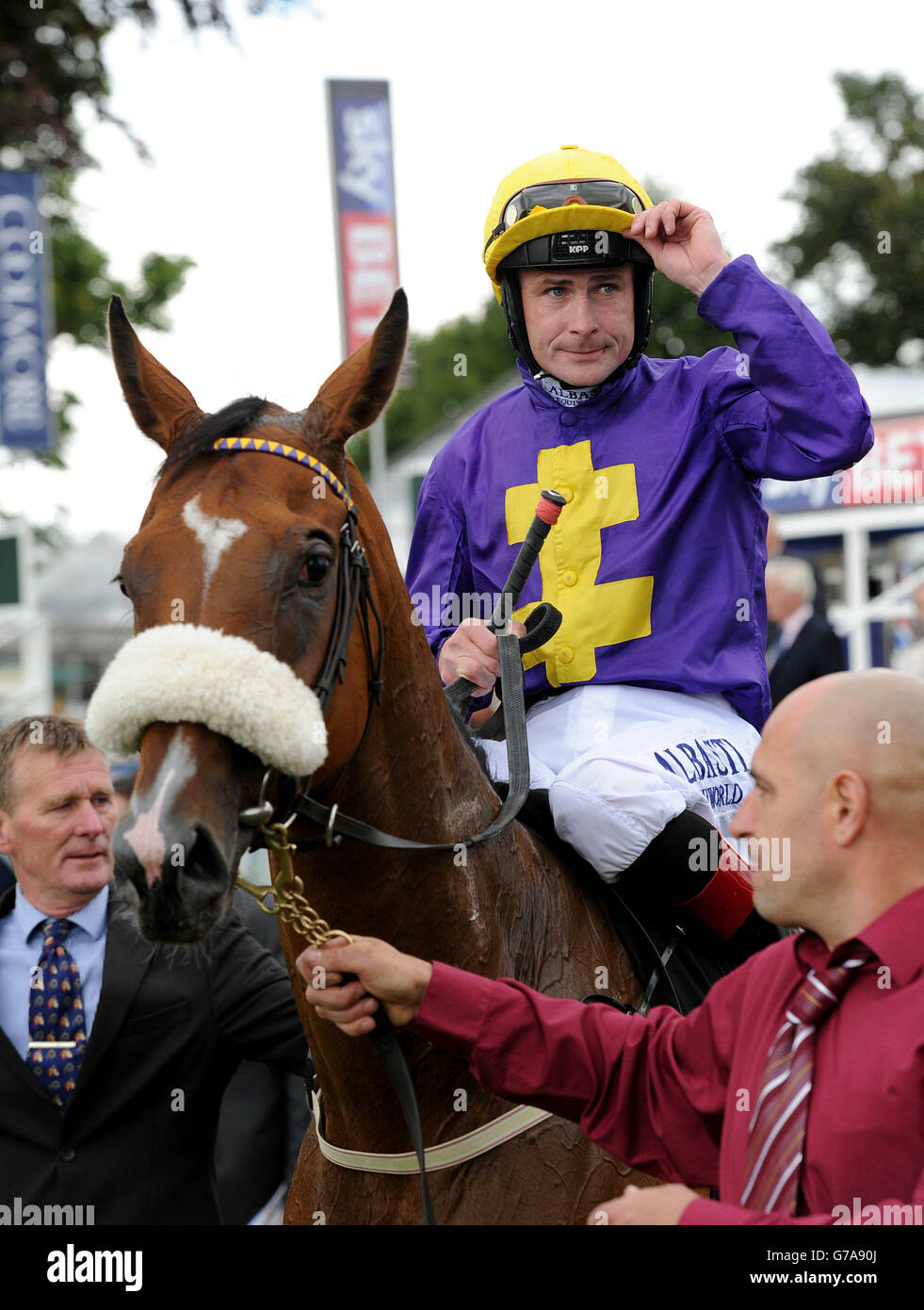 Pat Smullen returns to the parade ring after riding Pale Mimosa to ...